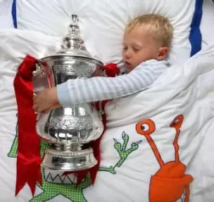 Young football fan will give the night ... with the Cup of England